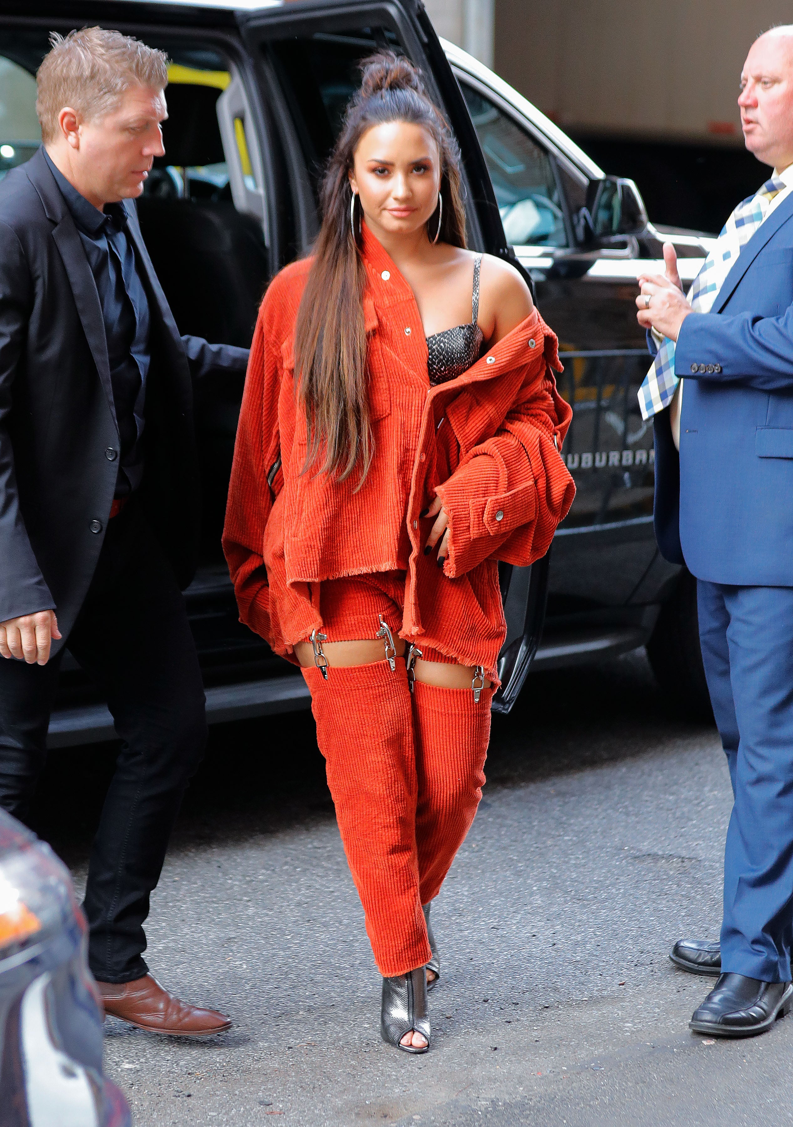 Demi Lovato Rocks Orange Corduroy and an Exposed Bra for Her Album ...