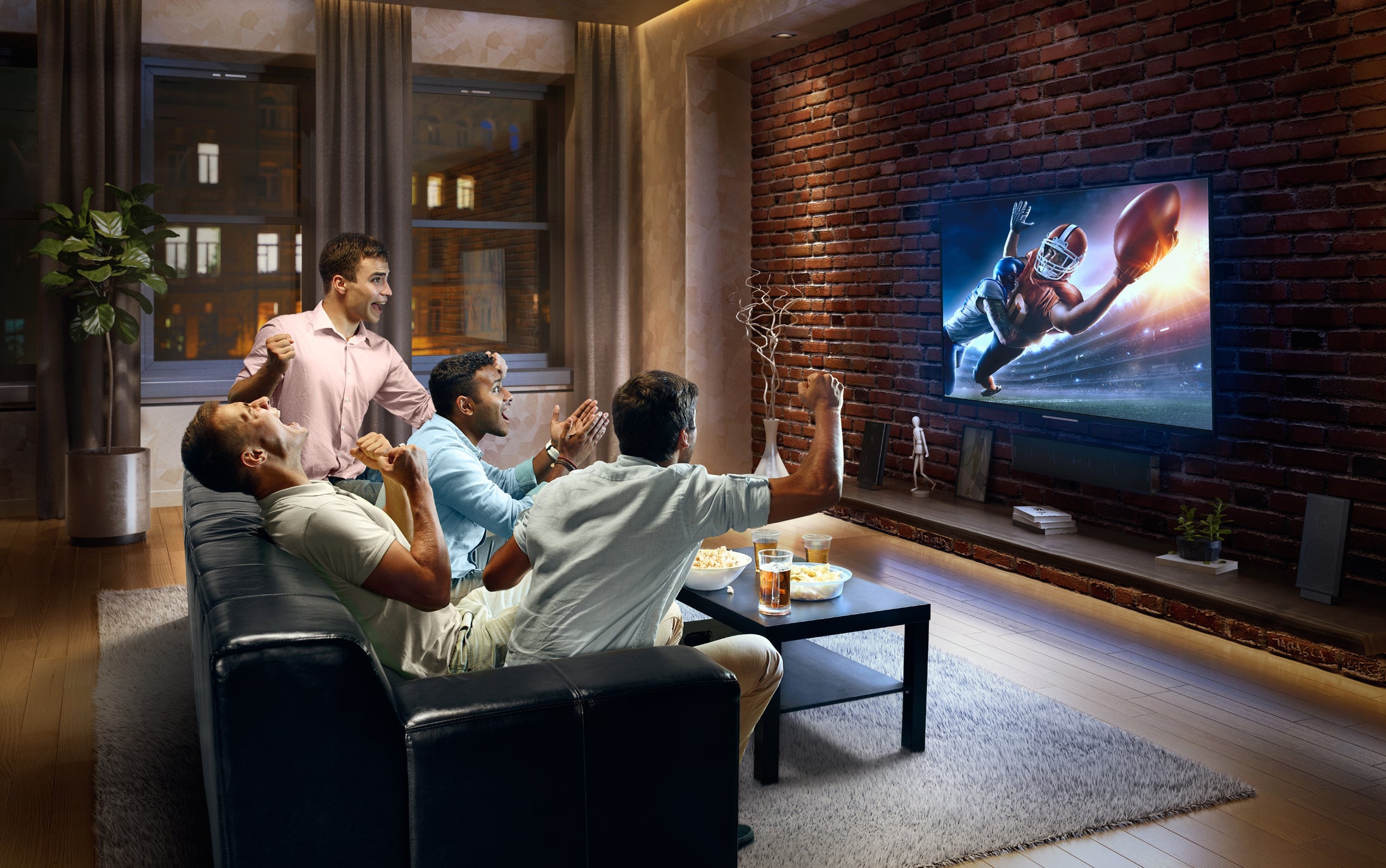 Family Watching Football On Tv