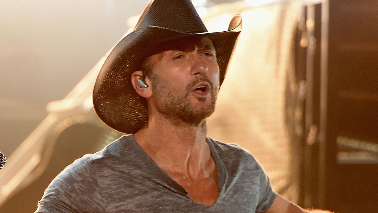 Tim McGraw Jumps Off Stage to Confront Audience Members Mid-Song ...