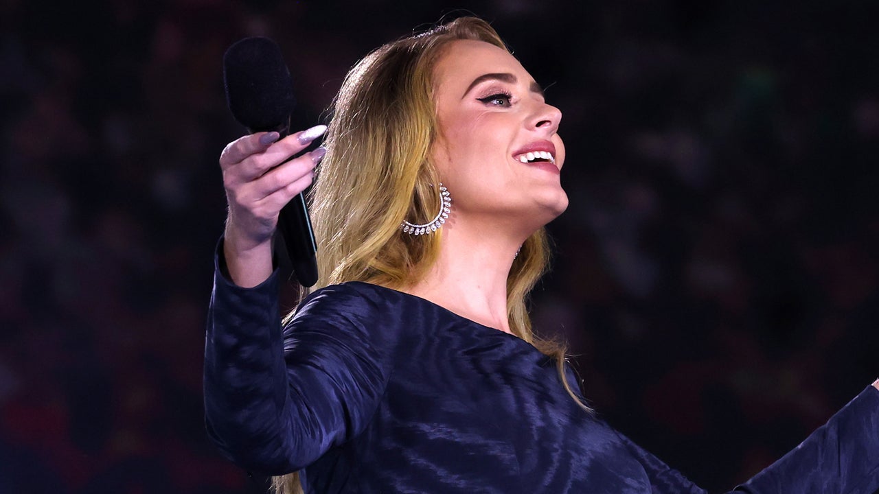 Adele Makes Wardrobe Change Onstage After Downpour During Munich Show | Entertainment Tonight