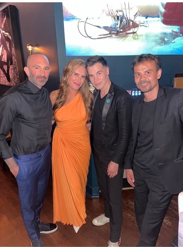 Star Sightings: Gigi Hadid Stuns in a Green Dress at Cannes Film ...