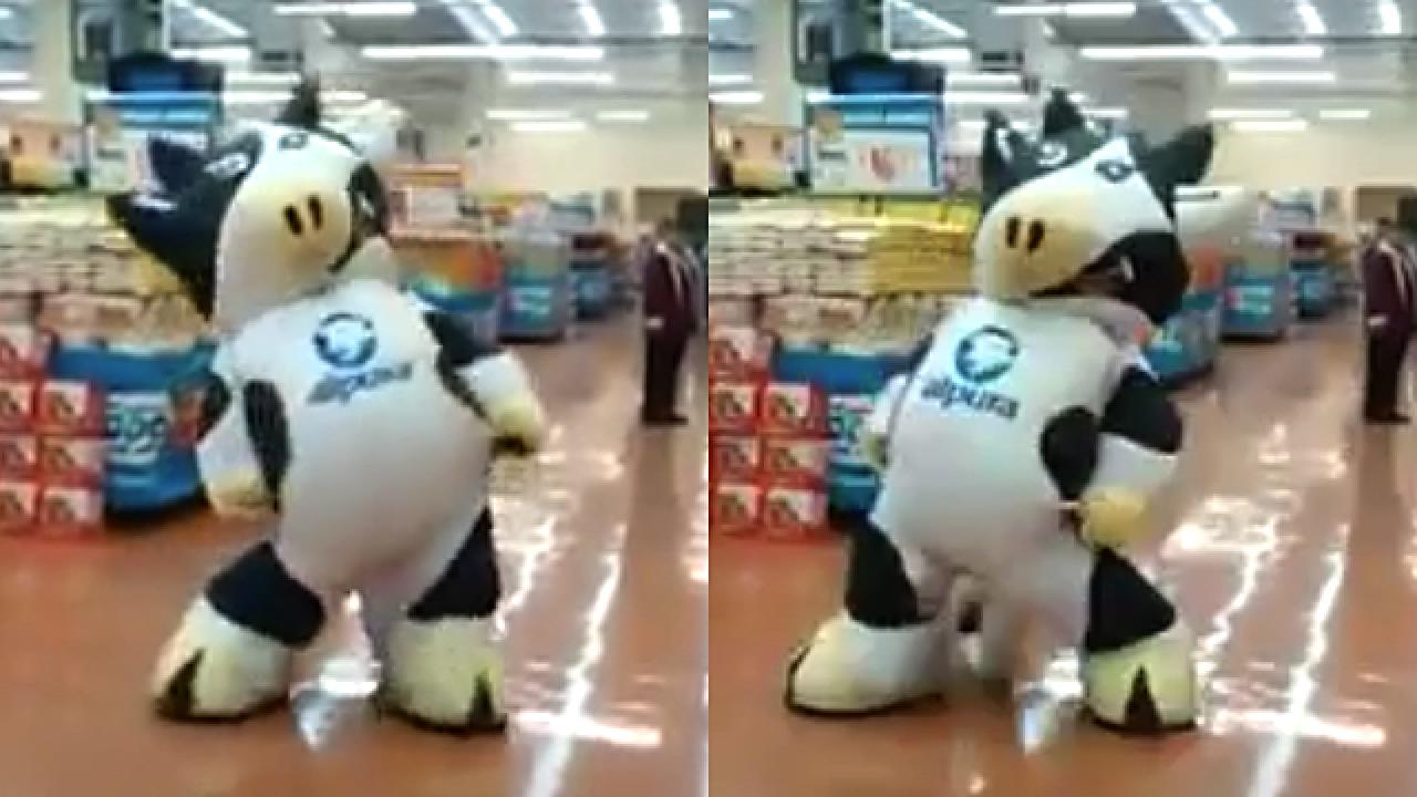 No One Loves Their Job More Than This Guy in a Cow Costume Dancing in a ...