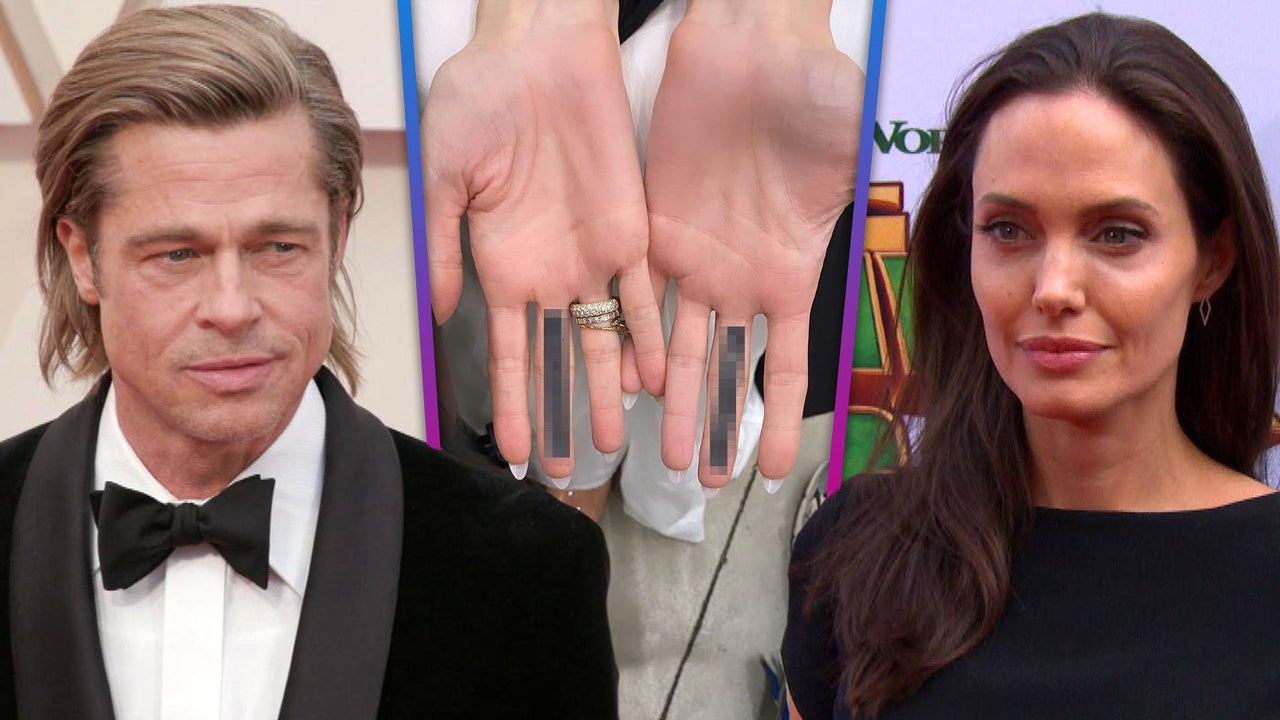 Angelina Jolie's New Middle Finger Tattoos: Why Fans Are Speculating ...